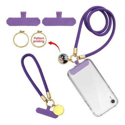China Purple Sublimation Blanks Phone Lanyard Strap With Sublimation Charm Blank for sale
