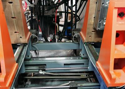 China Toggle Double Station Blow Molding Machine 6 Head 5l PP Bottle Blowing Machine for sale