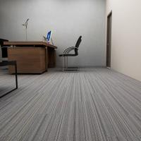 China Custom Puzzle Fireproof Plain Striped Jacquard Design Cushioned PP Material Carpet Tile for sale