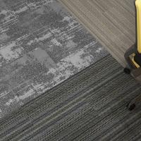 China Custom Puzzle Fireproof Plain Striped Jacquard Design Cushioned PP Material Carpet Tile for sale