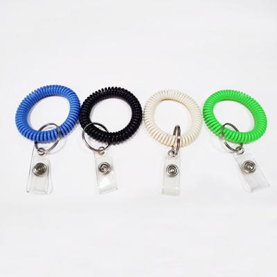 China Solid Colored Stretchable Plastic Bracelet Wrist Coil with Key Ring 2.3mm Cord 55mm Circle for sale