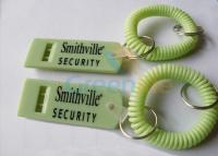 China Custom Colored Wrist Coil Key Chain Lightweight TPU Tubing 71x28x8mm with Flat Whistle for sale