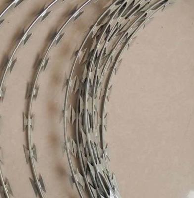 China Galvanized Pvc Stainless Steel Concertina Razor Barbed Tape Bto-22 Bto-60 Cbt-65 In Fencing for sale