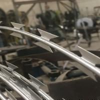 China Galvanized Barbed Bto 10 Concertina Razor Wire mesh Coil for sale