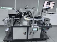 China High Performance Automatic RFID Textile Laundry Tag Production Line YLRP-2000 for sale