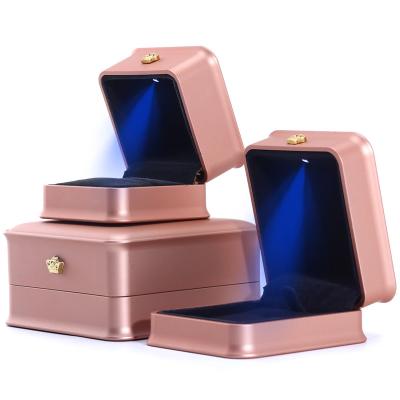 China Custom Luxury Crown Jewelry Packaging Box with LED Light Velvet 20cm for sale