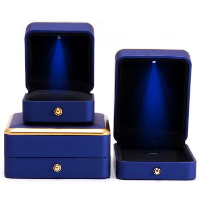 China Custom Square LED Jewelry Box with Light Blue Ring and Necklace Display Luxury Style for sale