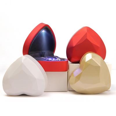 China Custom Size Heart-Shaped LED Jewelry Box with Velvet Lining and Silk Screen Logo for Rings Necklaces Earrings for sale