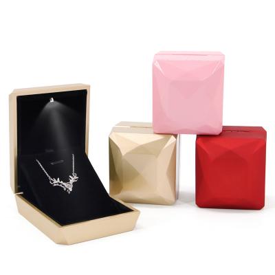 China Custom LED Jewelry Packaging Box with Diamond Face Design - PU Plastic & Velvet Interior for Luxury Ring Display for sale