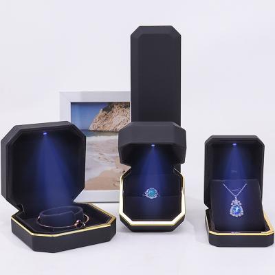 China OEM Handmade Black Octagon LED Light Jewelry Box with Velvet Insert 20cm for sale