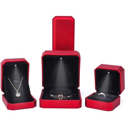 China Custom Luxury Jewelry Display Box with LED Light Red Paint Finish 10x10x5cm for sale