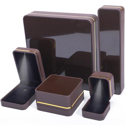 China Customizable Rectangle Jewelry Box with LED Light Velvet Lining Luxury Storage 30x20x10cm for sale