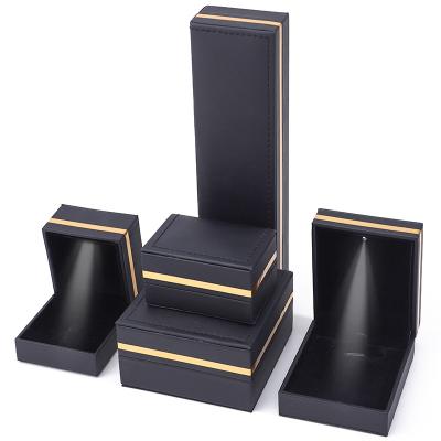 China Custom Black Jewelry Box with LED Light for Bracelet Deluxe PU Leather 30x20x10cm for sale