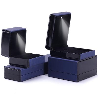 China Custom Logo LED Light Jewelry Box Blue Leather for Bracelet Necklace Ring 300000pcs Monthly for sale
