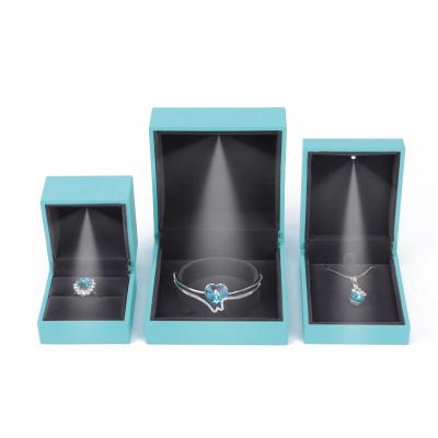 China Custom LED Light Jewelry Packaging Box for Necklace Bracelet Earrings Plastic Velvet for sale