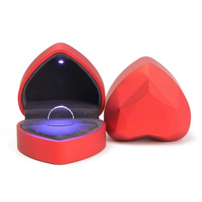 China LED Heart-Shaped Red Gem Cassette Jewelry Box Plastic Velvet Custom Logo for sale