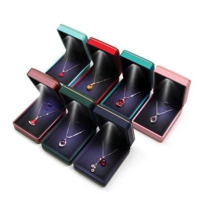 China Custom Logo Silk Screen Print Luxury LED Jewelry Storage Box with Light 2 Colors for sale