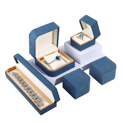 China Blue Microfiber Leather Jewelry Box 7x7x5cm for Rings Earrings Hanhong for sale