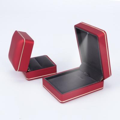 China Plastic Velvet Jewelry Box with LED Light Custom Logo Silk Screen Printing for sale