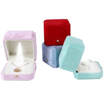China Custom Octagonal Velvet Jewelry Box Packaging with Embossed Logo for Rings for sale