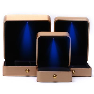 China Handmade Luxury LED Jewelry Box Custom Plastic Spray Painted Square Necklace Ring Storage 20cm for sale