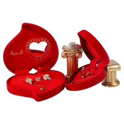 China Custom Velvet Jewelry Box for Ring Necklace and Stud Earrings Set with Embossing Logo for sale
