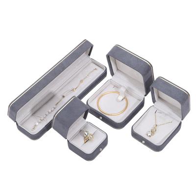 China Custom Velvet Jewelry Box 6.5x6.5x6cm Hot Stamping Logo for Necklace Bracelet Earrings for sale