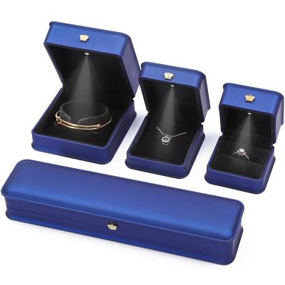 China Customizable Soft Convex PU Leather LED Jewelry Storage Box Luxury Dark Blue Case 300000pcs Monthly for sale