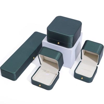 China Custom Green PU Leather Jewelry Packaging Box for Wedding Necklace Earrings Ring 300000pcs Monthly for sale