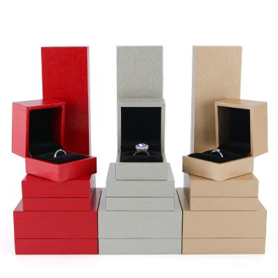 China Custom Luxury Cardboard Jewelry Box with Velvet Lining - Embossing & Hot Stamping Options for Bracelets and Rings for sale