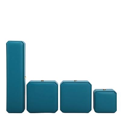 China Hanhong Octagonal Crown PU Leather Jewelry Box Cyan for Bracelets Earrings Rings 8x8x4cm for sale