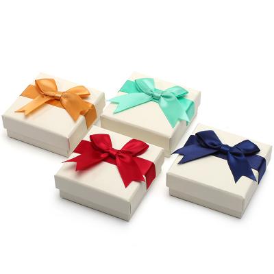 China Custom Logo Jewelry Box with Velvet Lining and Ribbon Bow - Heaven and Earth Cover Design for Premium Packaging for sale