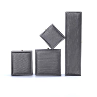 China Custom Leather Jewelry Box with Gold Edge for Ring Necklace Bracelet Wedding Packaging for sale