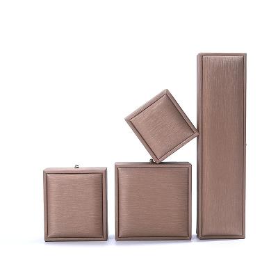 China Custom PU Leather Jewelry Box with Velvet Lining for Rings Necklaces Bracelets for sale