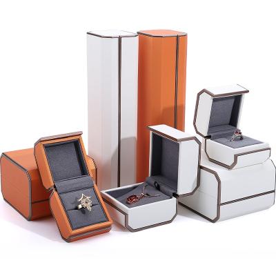China Custom Gold PU Leather Jewelry Packaging Box Octagonal Case for Rings Necklaces Bracelets for sale