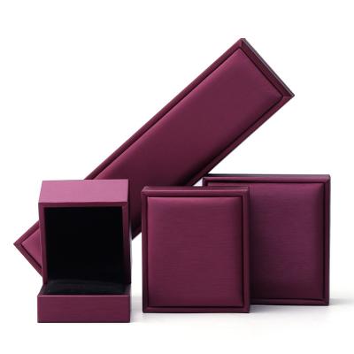 China Custom Luxury Velvet Jewelry Packaging Box Purple PU Leather 300000 Pieces Monthly Supply for sale
