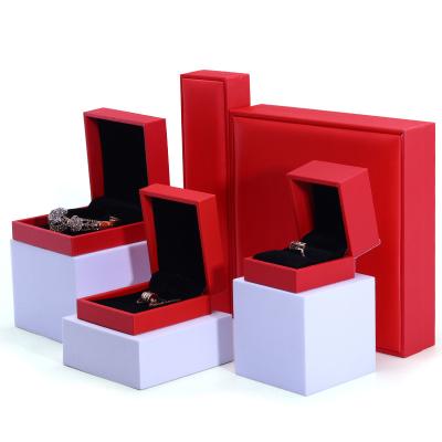 China Custom Red Faux Leather Jewelry Box Luxury Packaging Box 300000 Pieces Monthly Supply for sale
