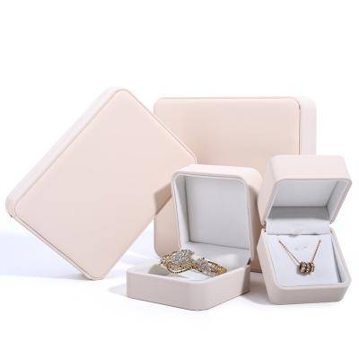 China Custom Luxury Necklace Packaging Box with White PU Leather, Velvet Lining and Gold Buckle Closure - Multiple Size Options for sale