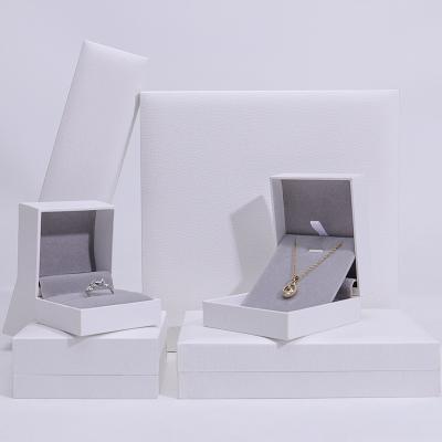 China Handmade Eco Cardboard Flip White Jewelry Box - Customizable Size & Logo with 300,000 Monthly Capacity for sale