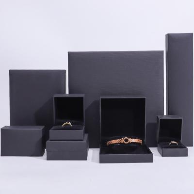 China Handmade Eco Cardboard Flip Black Jewelry Box - Customizable Size & Logo with 300,000 Monthly Capacity for sale