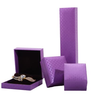 China Custom Purple Paper Jewelry Box 4x4x4.5cm with Hot Stamping for Pendant Bracelet Necklace Ring for sale