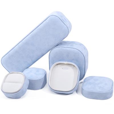 China Luxury Blue Velvet Jewelry Box with Magnetic Closure Multi-Compartment 12 Slot Ring Holder for sale