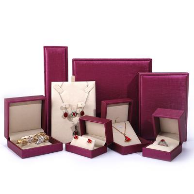 China Custom High End Rose Red Pu Leather Jewelry Box for Necklace Bracelet Earring Ring Packaging with Logo for sale