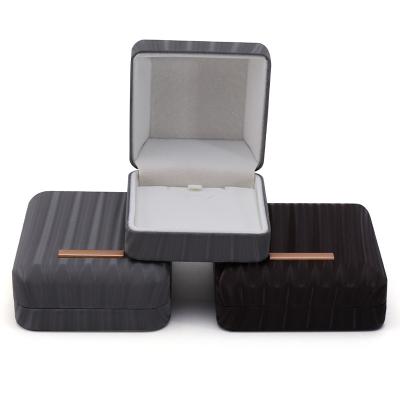 China High-End Ray Grain Faux Leather Jewelry Packaging Box with Golden Bar Ornament Custom Size for sale