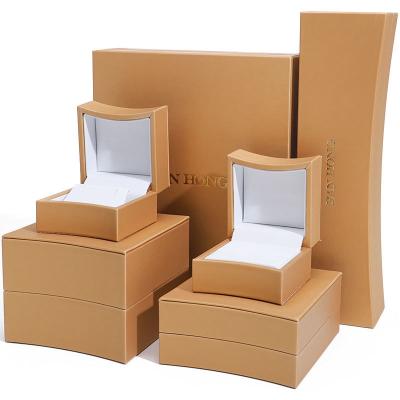 China Golden Arc Shaped Faux Leather Jewelry Box Luxury Storage Case Custom Size 300000pcs Monthly Supply for sale
