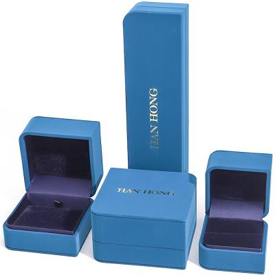 China Arc Diamond Shaped PU Leather Jewelry Storage Box Set for Ring Pendant Packaging Custom Size for sale