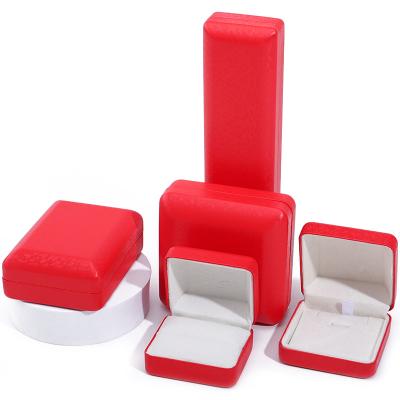 China Customizable Red Convex Roof PU Leather Jewelry Box Set with Velvet Lining 300000pcs Monthly Supply for sale