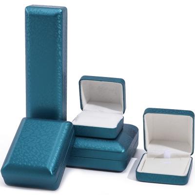 China Peacock Blue Snow Grain PU Leather Jewelry Box Luxury Gift Set OEM Custom Size for sale