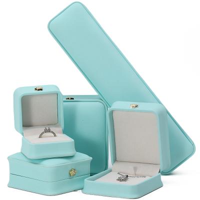 China Round Corner Arc Shaped PU Leather Luxury Jewelry Box Set with Crown Ornament Custom Size for sale