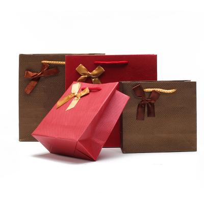 China Custom Twill Grain Cardboard Tote Gift Bags for Jewelry Packaging - 300,000 Monthly Capacity with 20-Day Production for sale